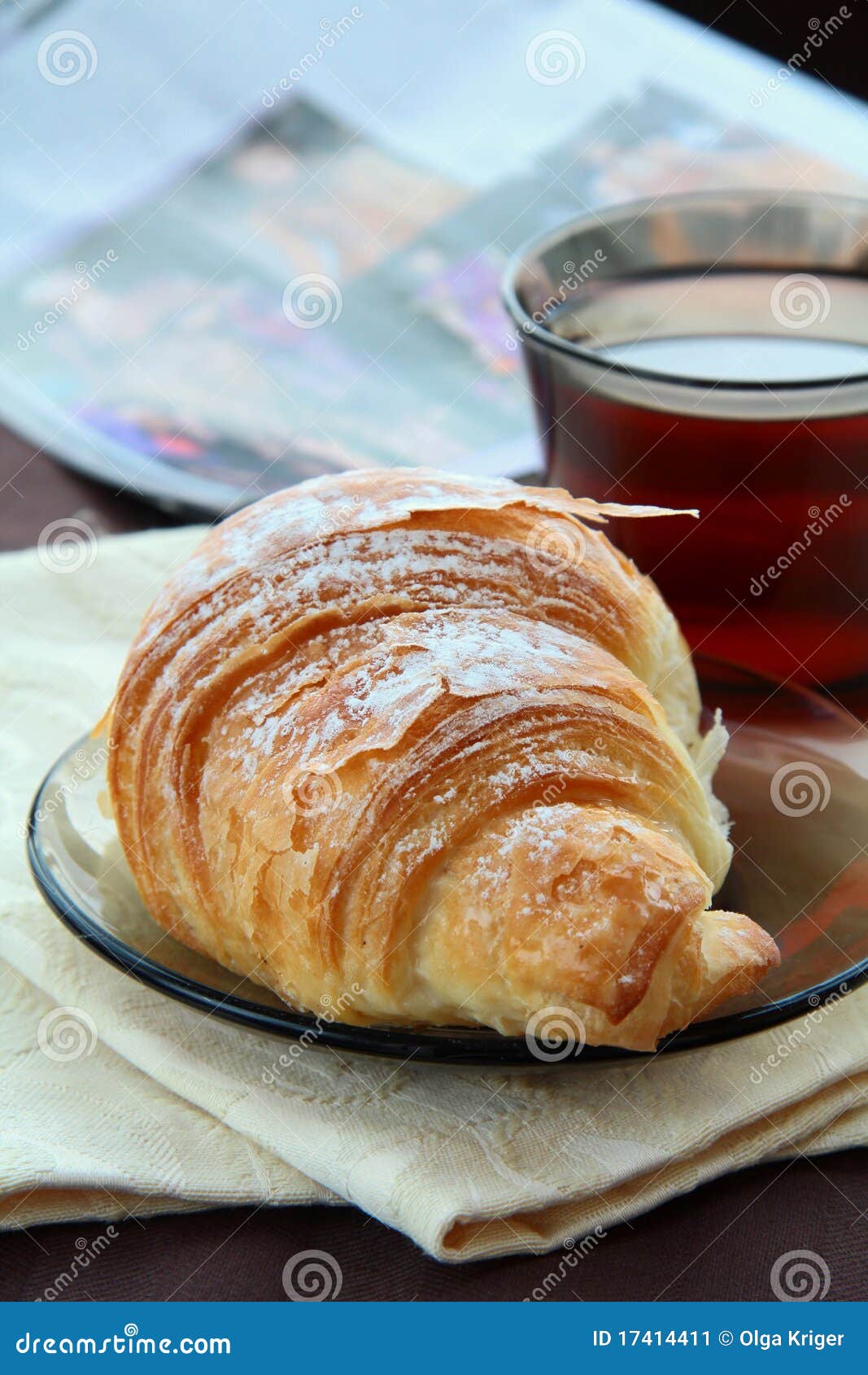 Croissant and a cup of tea stock image. Image of cuisine - 17414411