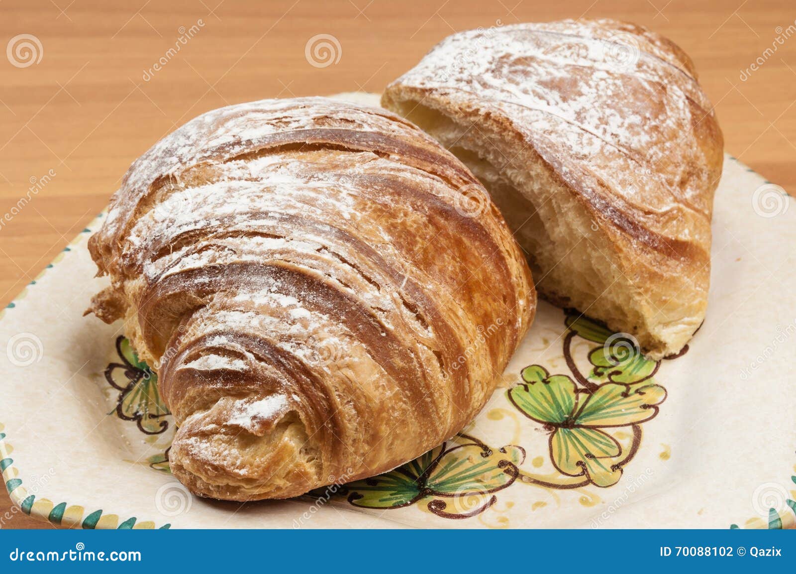 Croissant Cut in Half in a Dish Stock Photo - Image of snack, wood ...