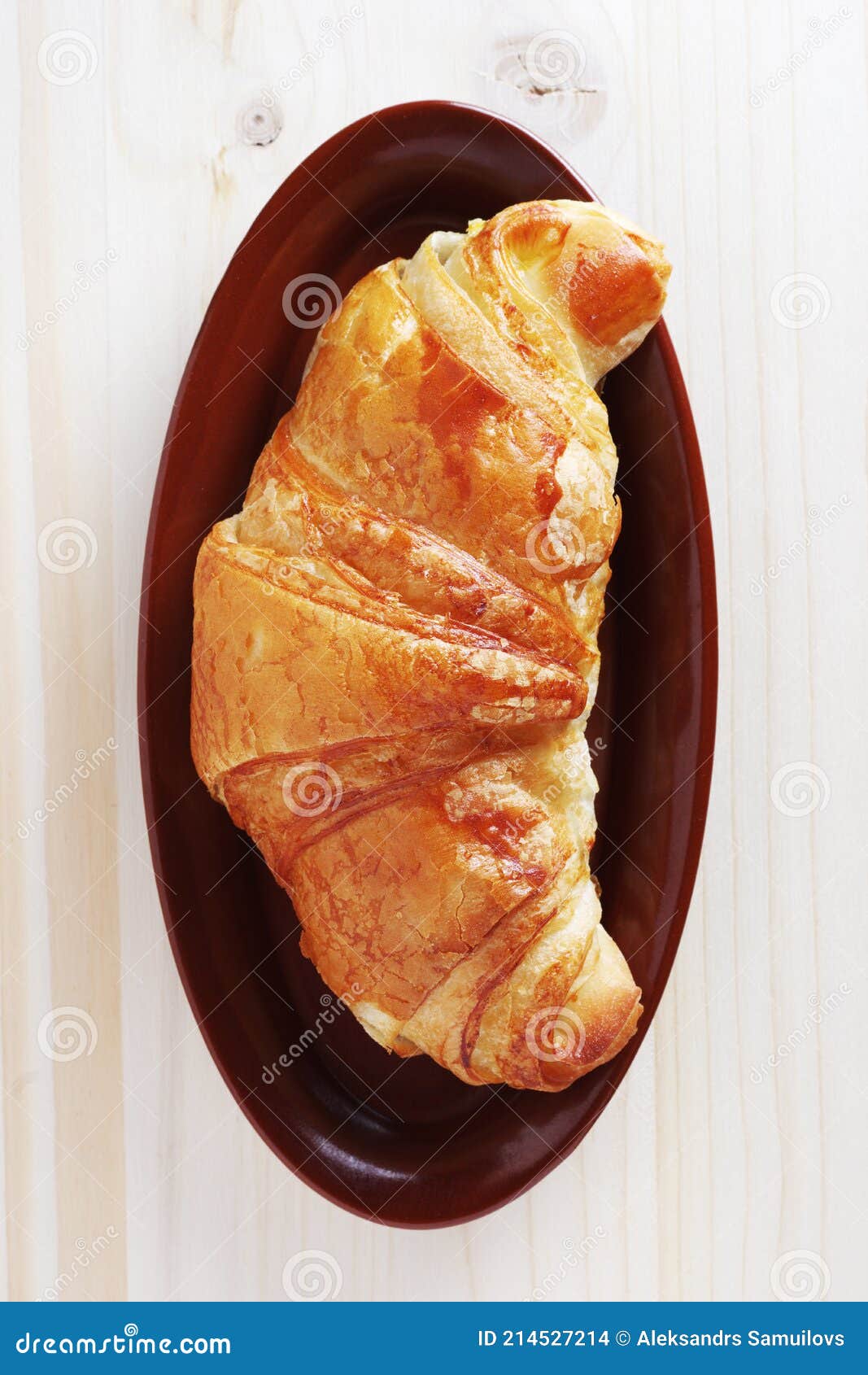 Croissant in a plate stock photo. Image of bake, plate - 214527214