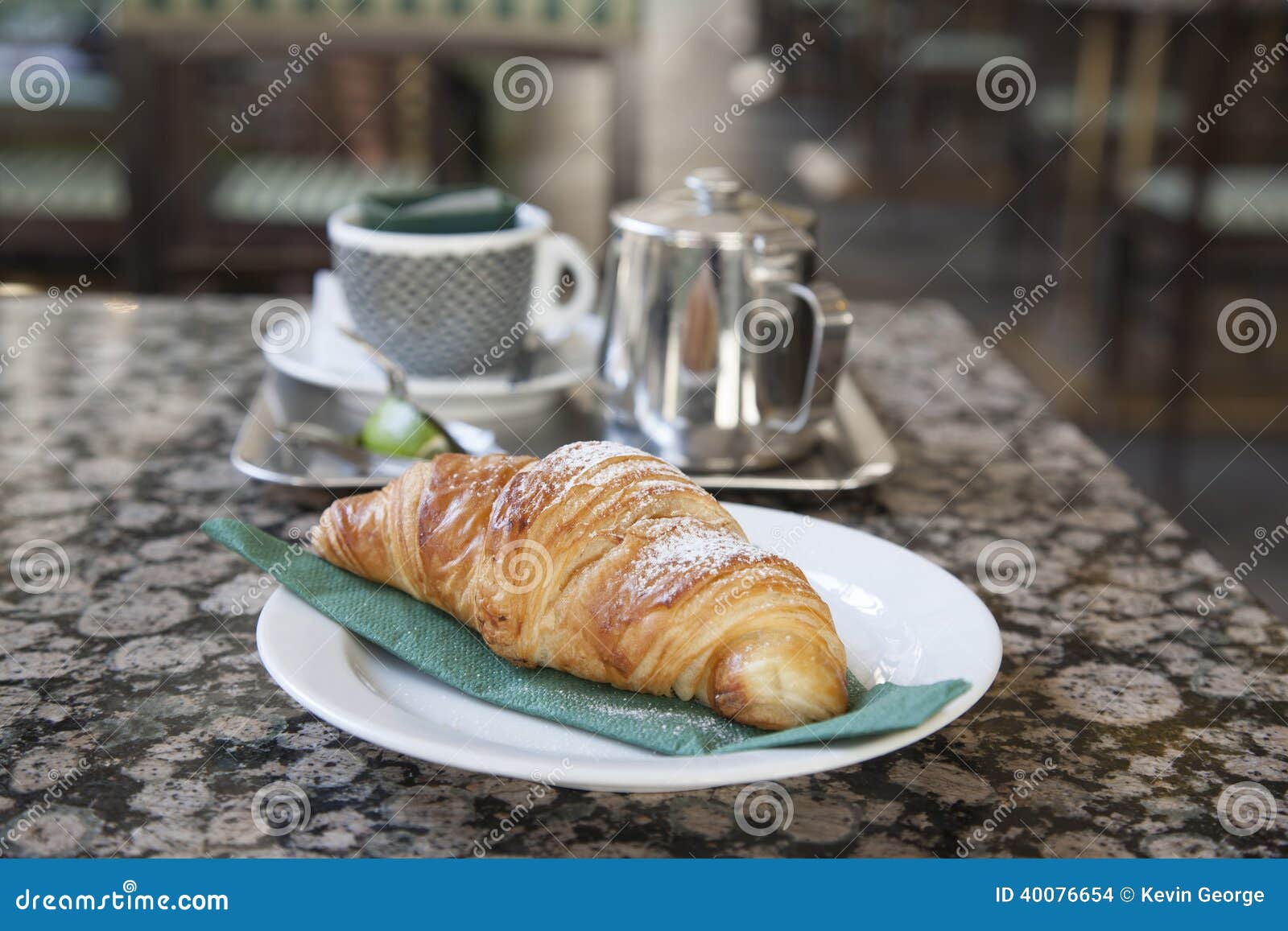 Croissant and Pot of Tea on Cafe Table Stock Photo - Image of table ...