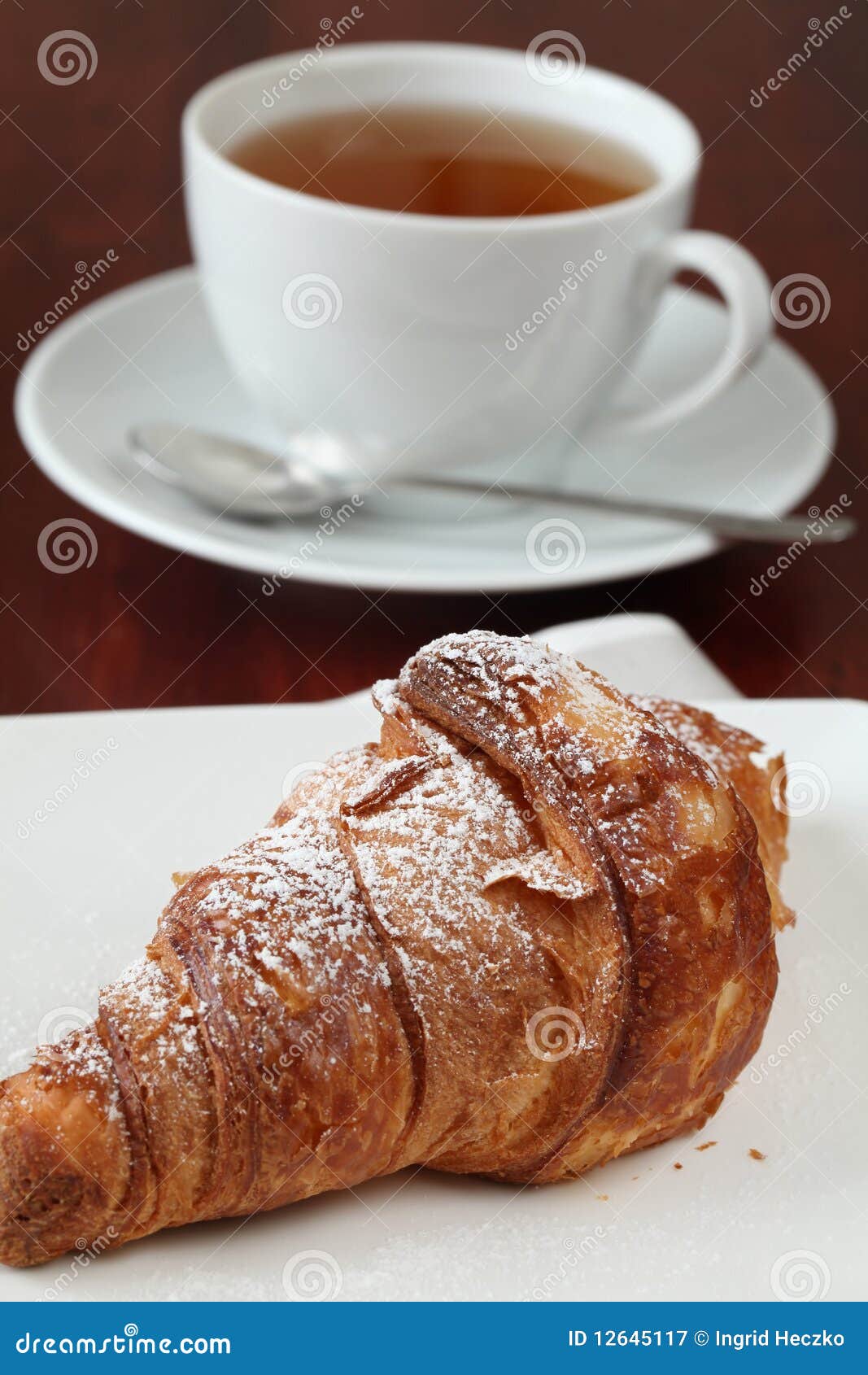 Croissant and tea stock image. Image of breakfast, sweet - 12645117