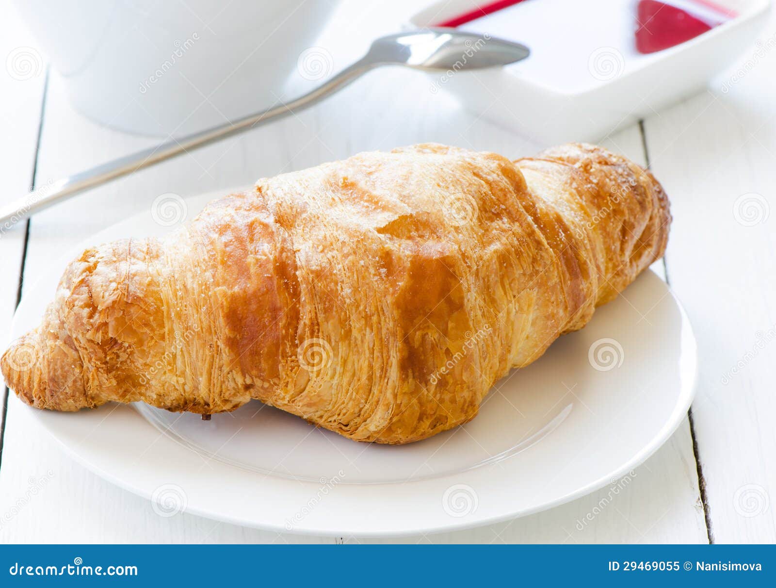 Croissant on white table stock image. Image of close - 29469055