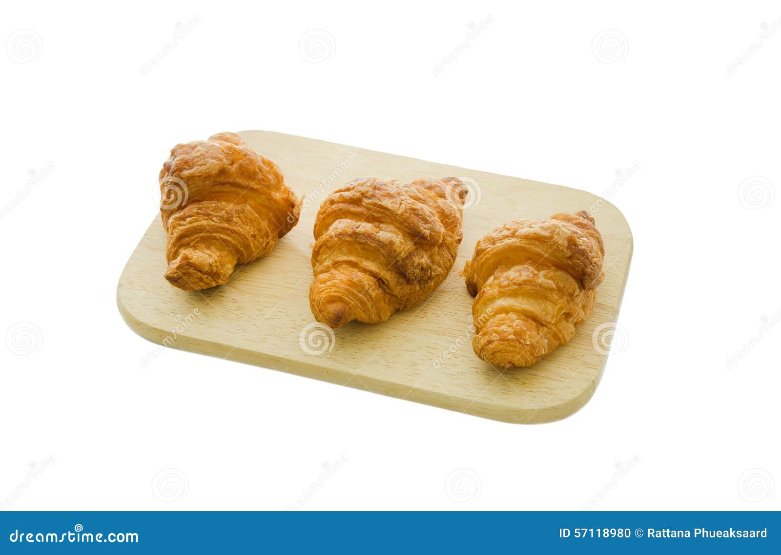 Croissant on wood board stock photo. Image of butter - 57118980