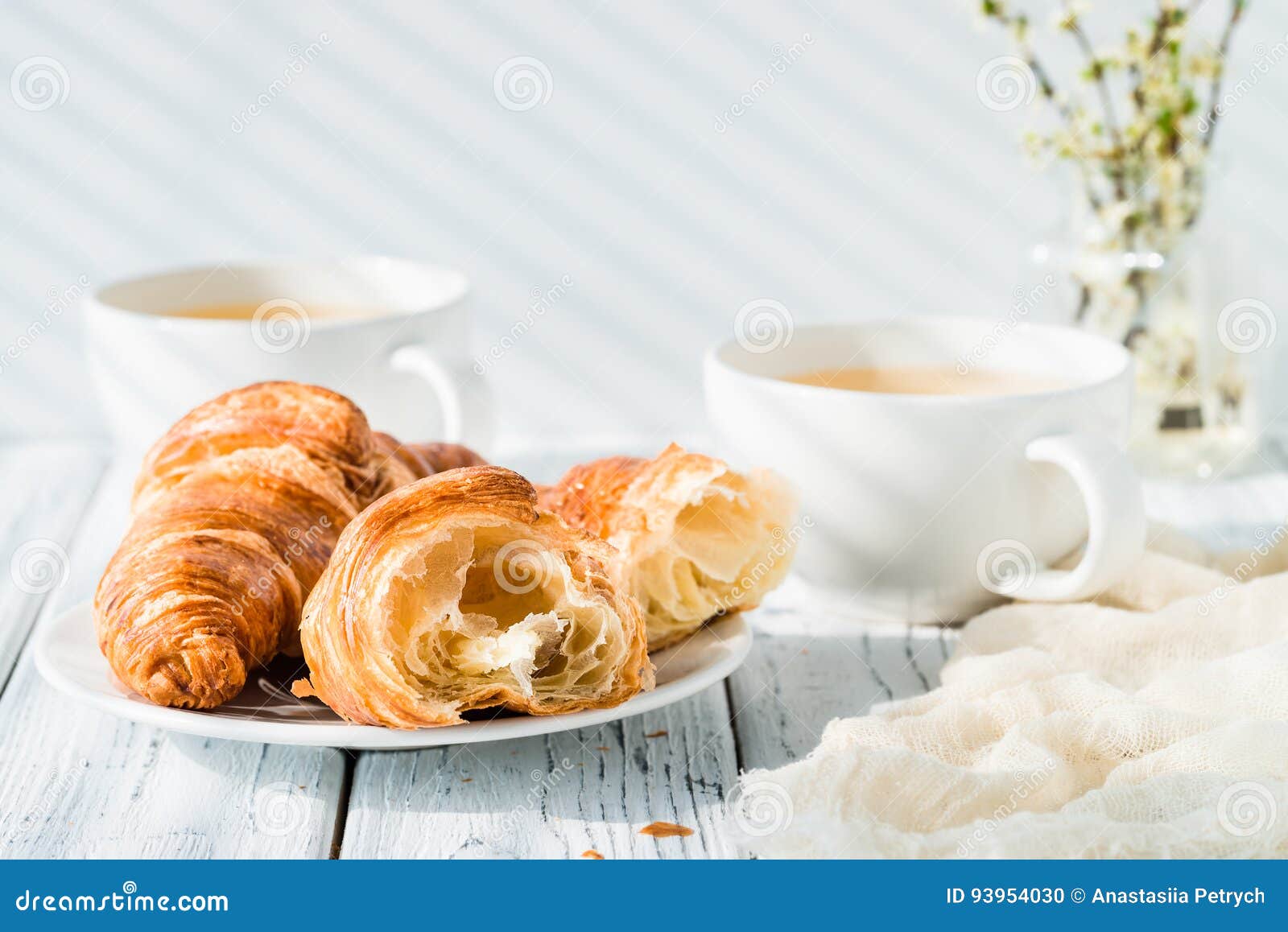 Croissants with Cups of Herbal Tea on White Rustic Table Stock Photo ...