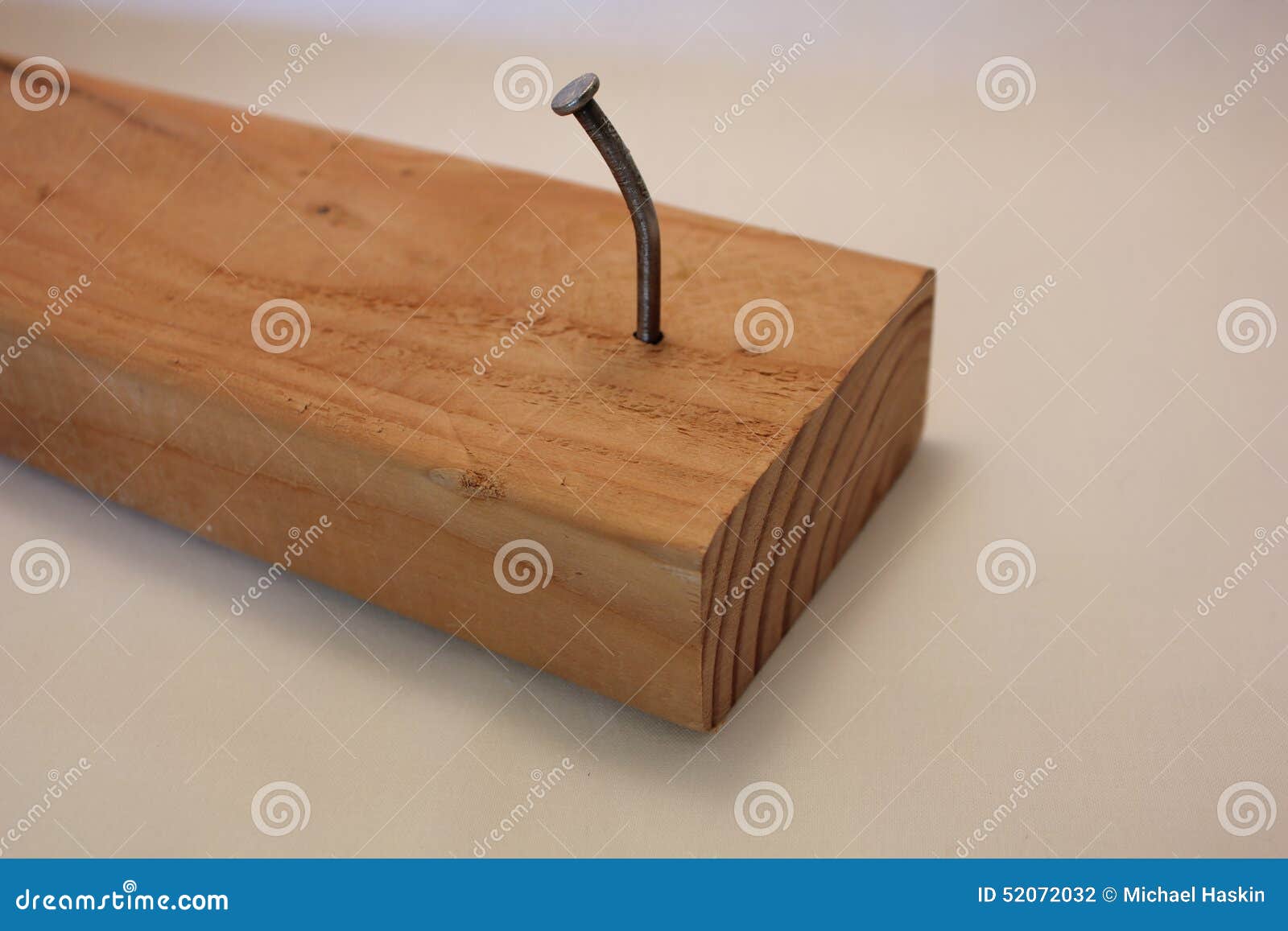 Crooked Nail in a Block of Wood Stock Photo - Image of shot, nail: 52072032