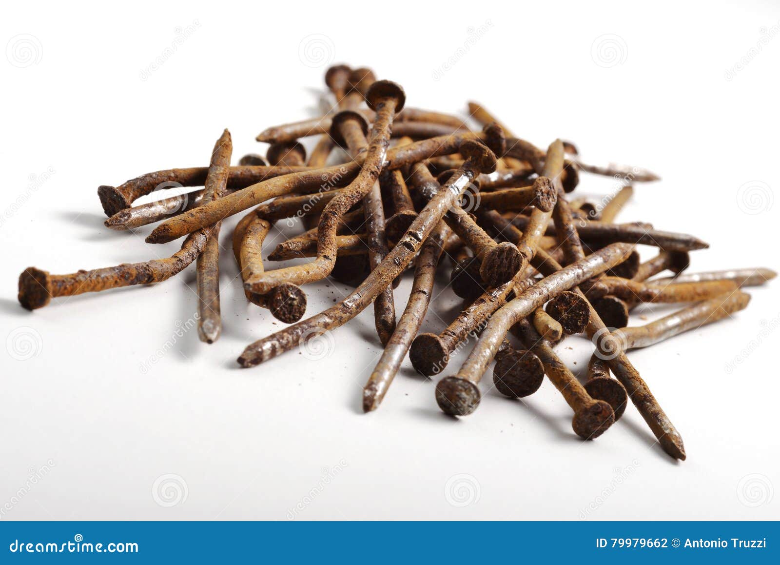 Crooked and rusty nails stock photo. Image of curved - 79979662