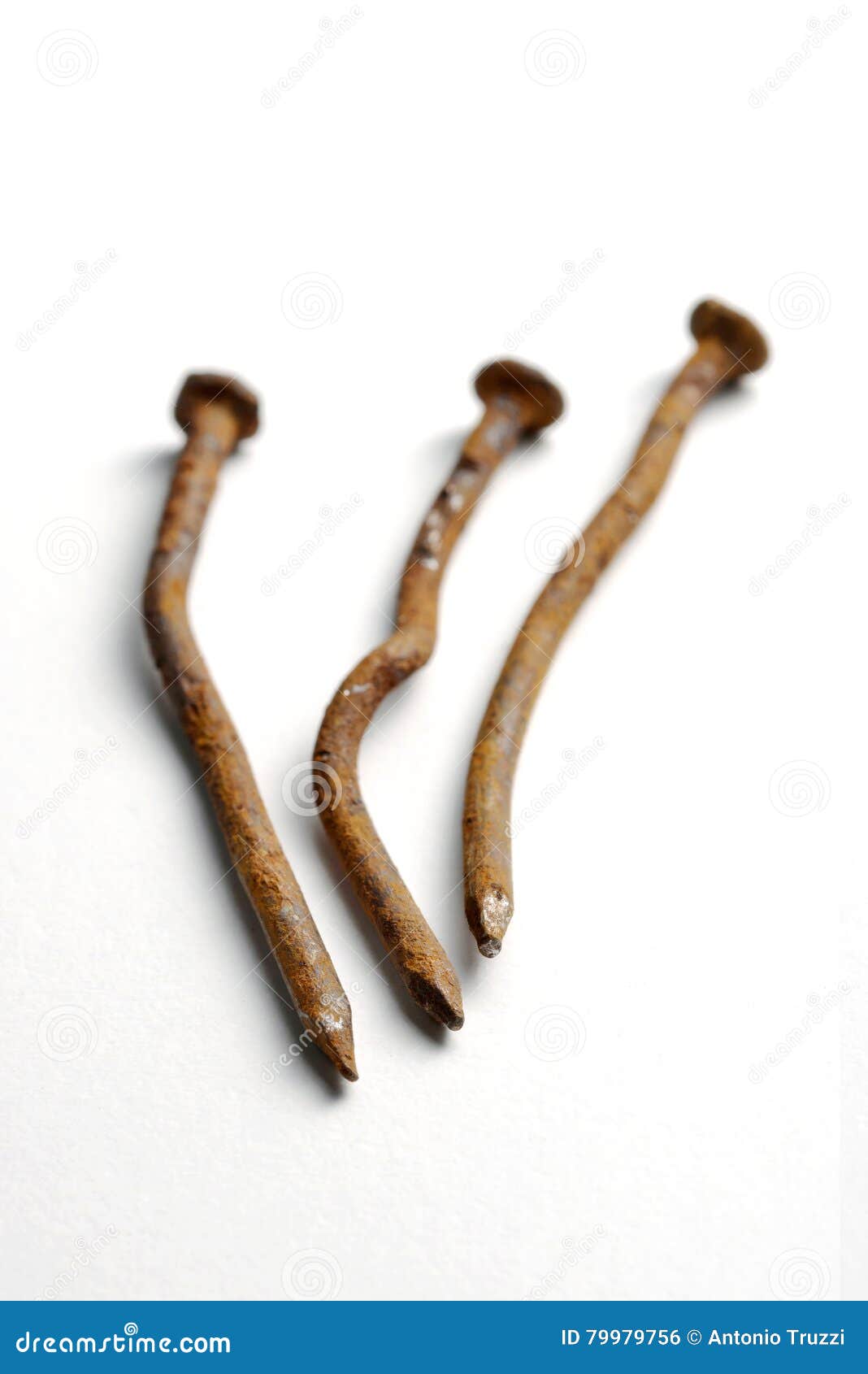 Crooked and rusty nails stock photo. Image of pile, construction - 79979756