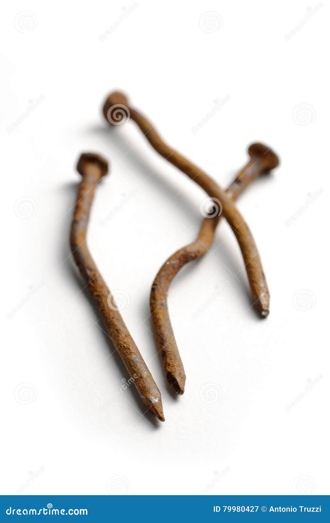 Crooked and rusty nails stock image. Image of spikes - 79980427
