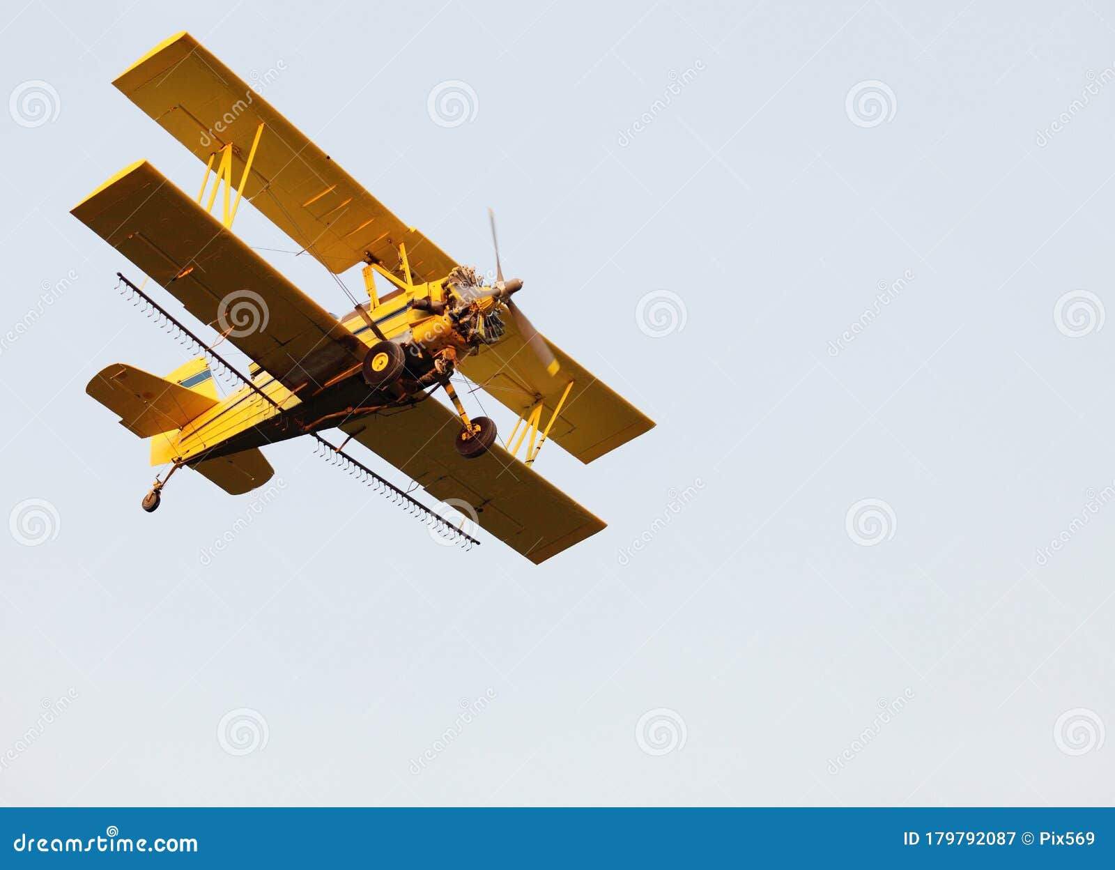 A Crop Duster Aircraft Against a Blue Sky. Stock Image - Image of ...
