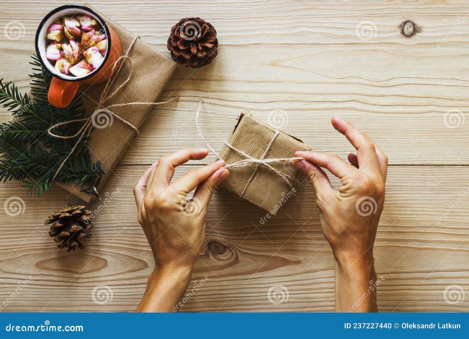 Crop Hand Tying Rope Gift Box. High Quality Photo Stock Photo - Image ...