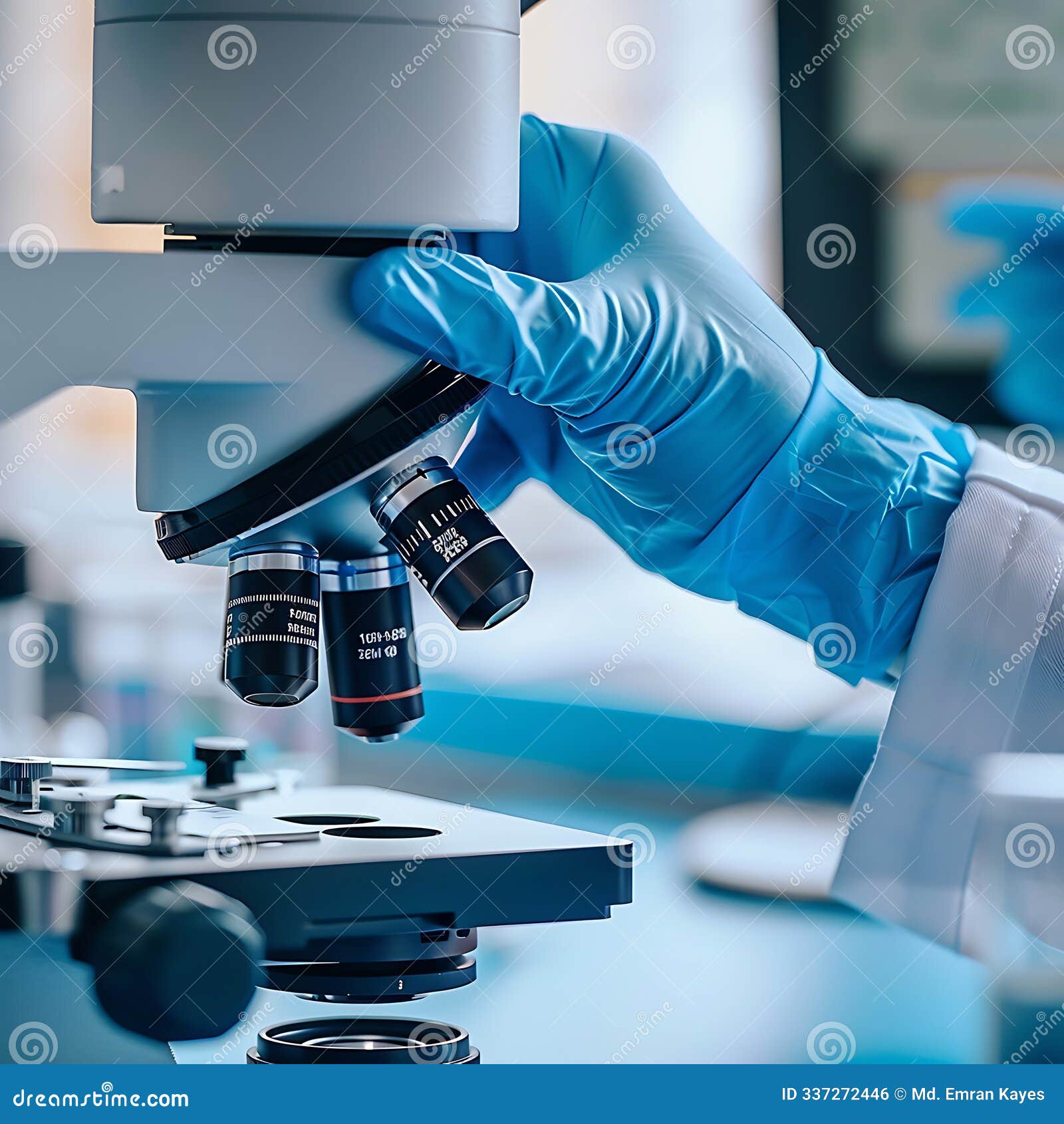 Hand Of A Researcher With Small Reagent Bottles With Fluid In The ...