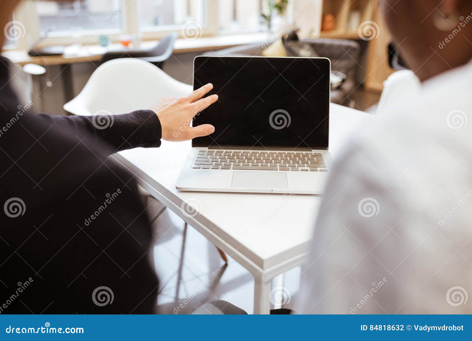 Cropped Backview Image of Two Young Students Using Laptop Stock Photo ...