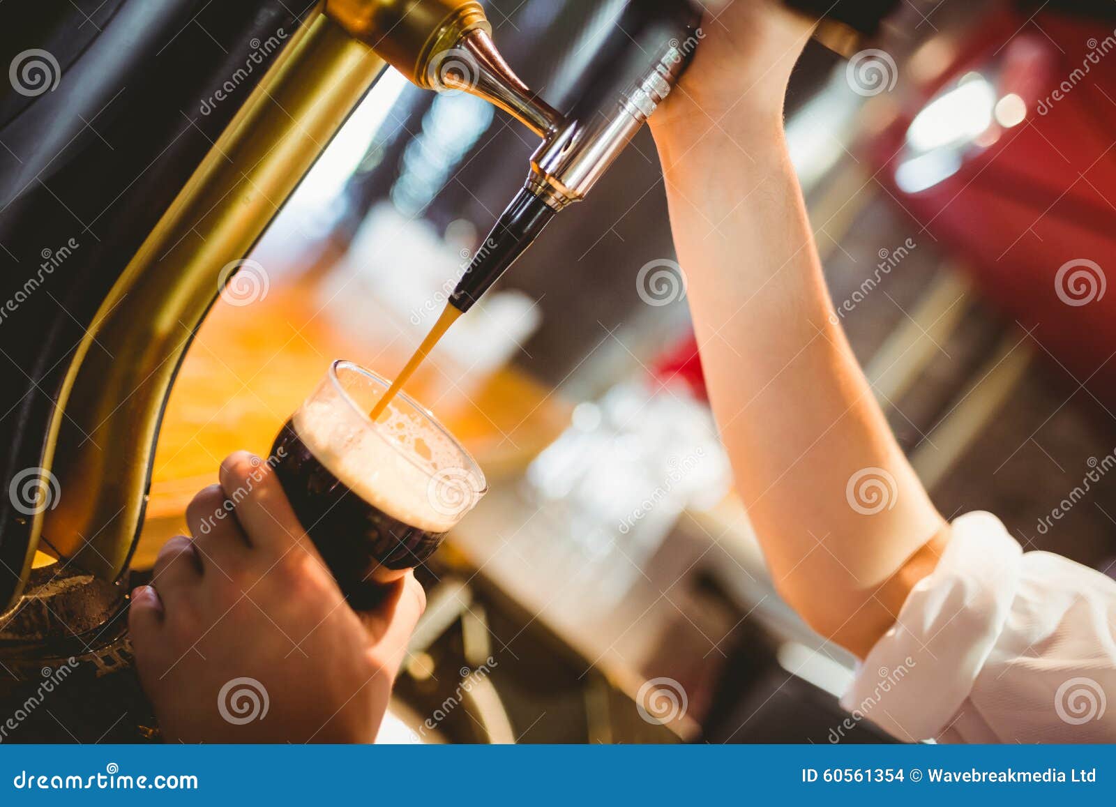 Cropped Hand of Barkeeper Dispensing Beer Stock Photo - Image of ...