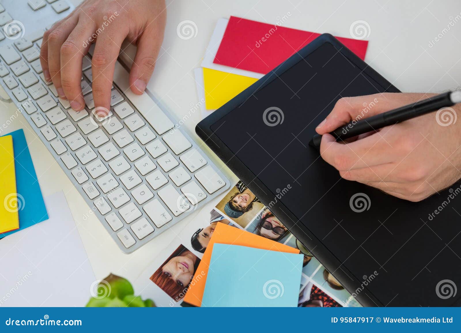 Cropped Hand of Designer Writing on Graphics Tablet Stock Image - Image ...