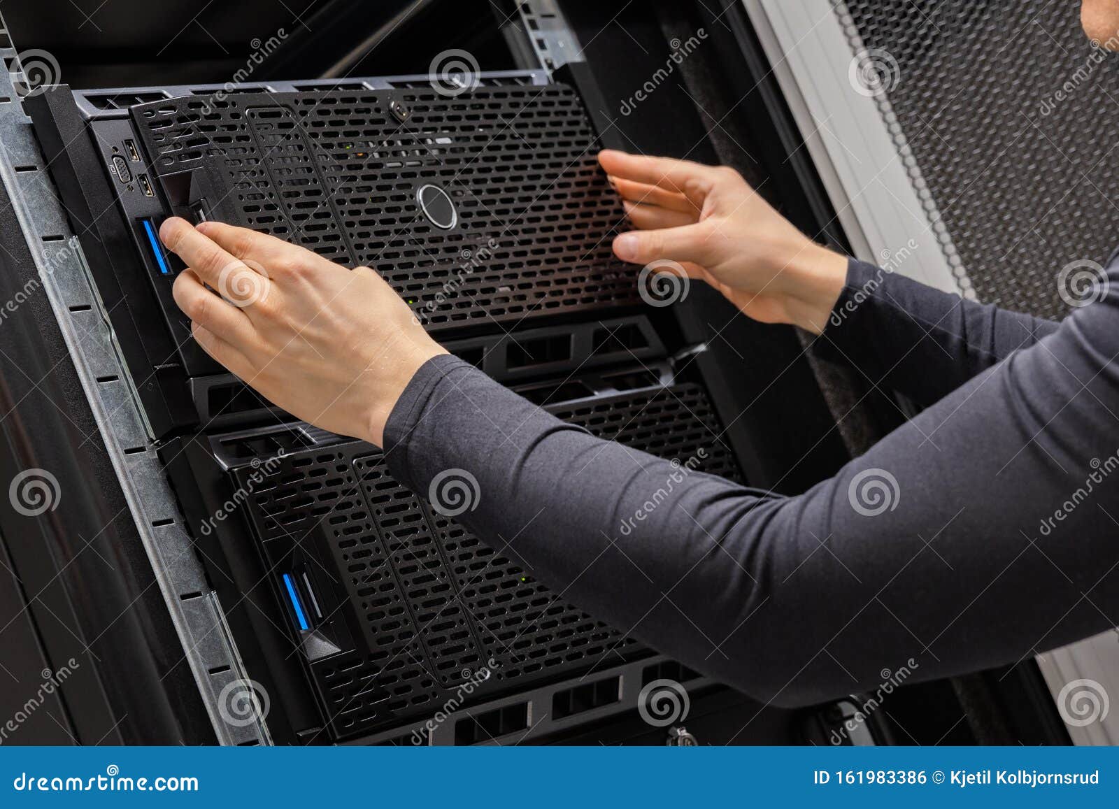 Hands of Male Technician Installing Servers in Datacenter Stock Photo ...