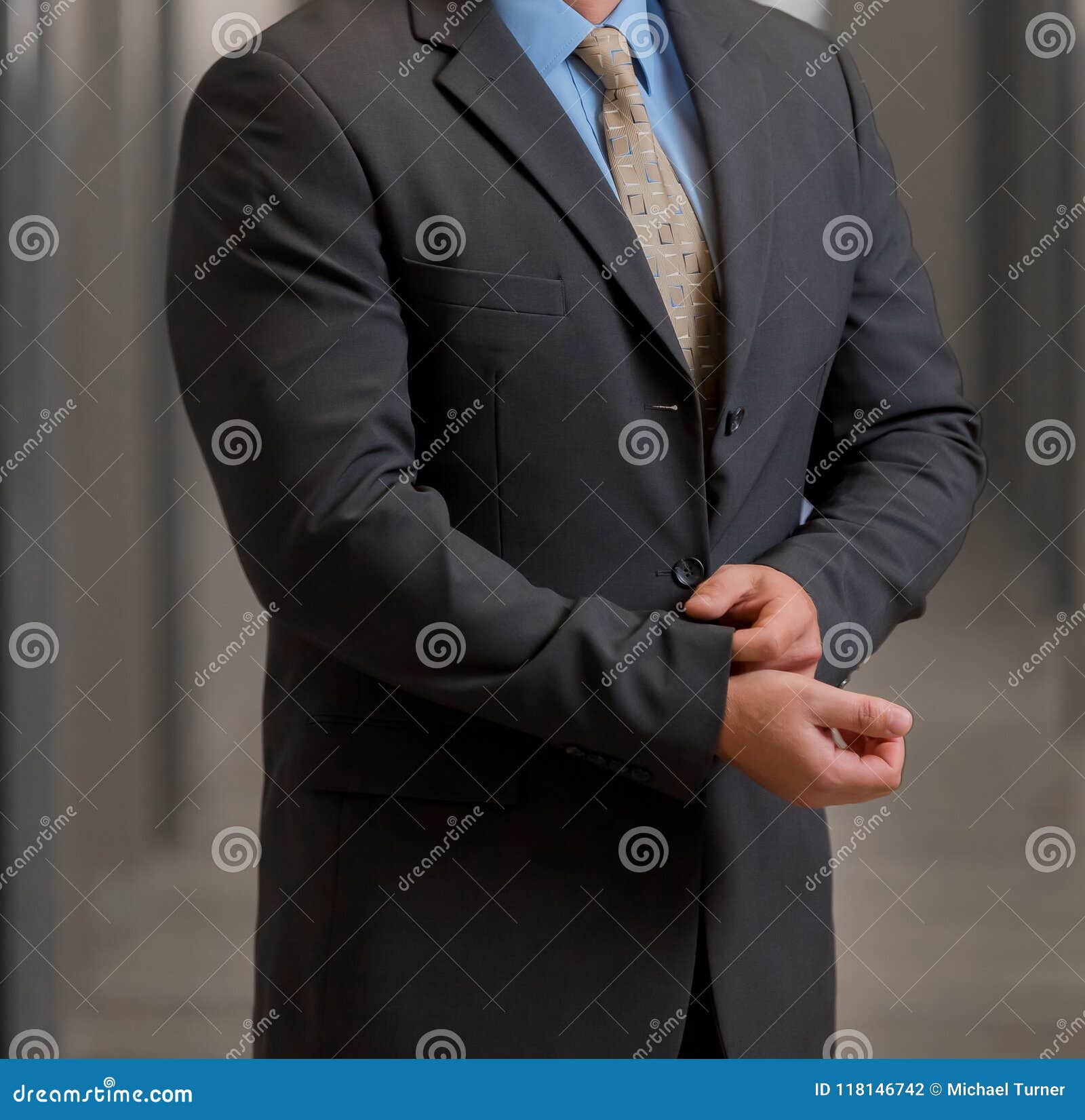 Cropped Head Man Standing in a Smart Suit Holding Cuff Stock Photo ... Cropped Head Man Standing in a Smart Suit Holding Cuff Stock Photo ...