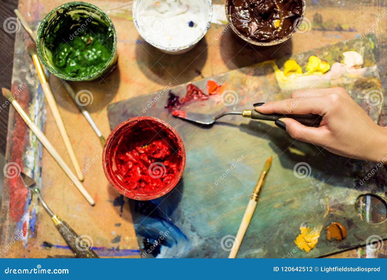 Cropped Image of Artist Applying Paint on Palette Stock Photo - Image ...