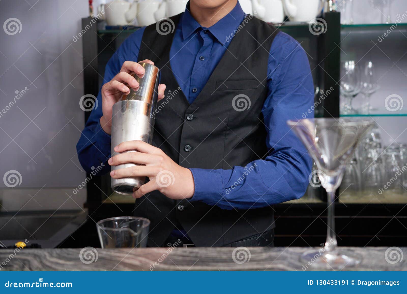 Bartender making cocktail stock image. Image of catering - 130433191
