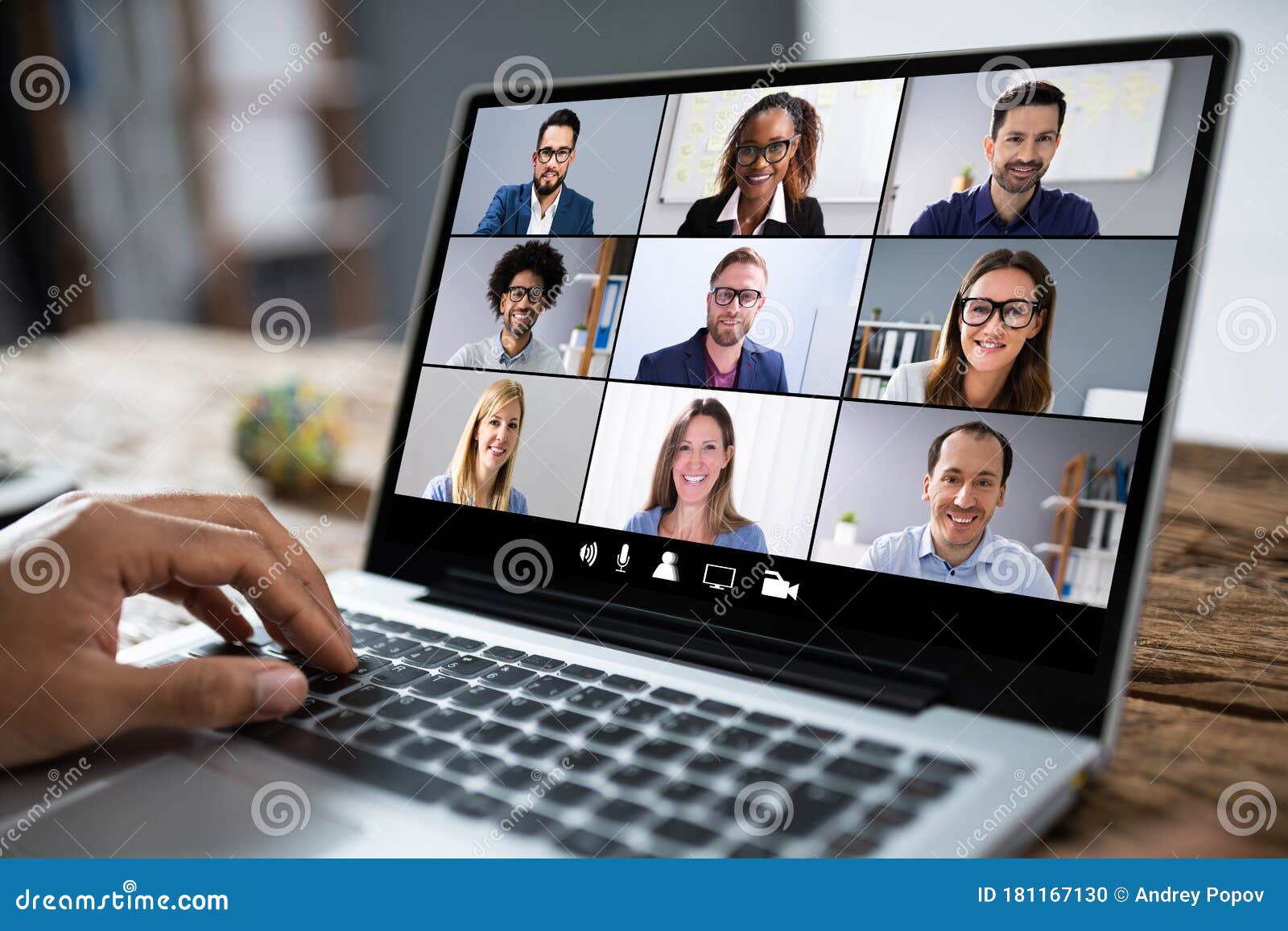 Man Working from Home Having Group Videoconference on Laptop Stock ...