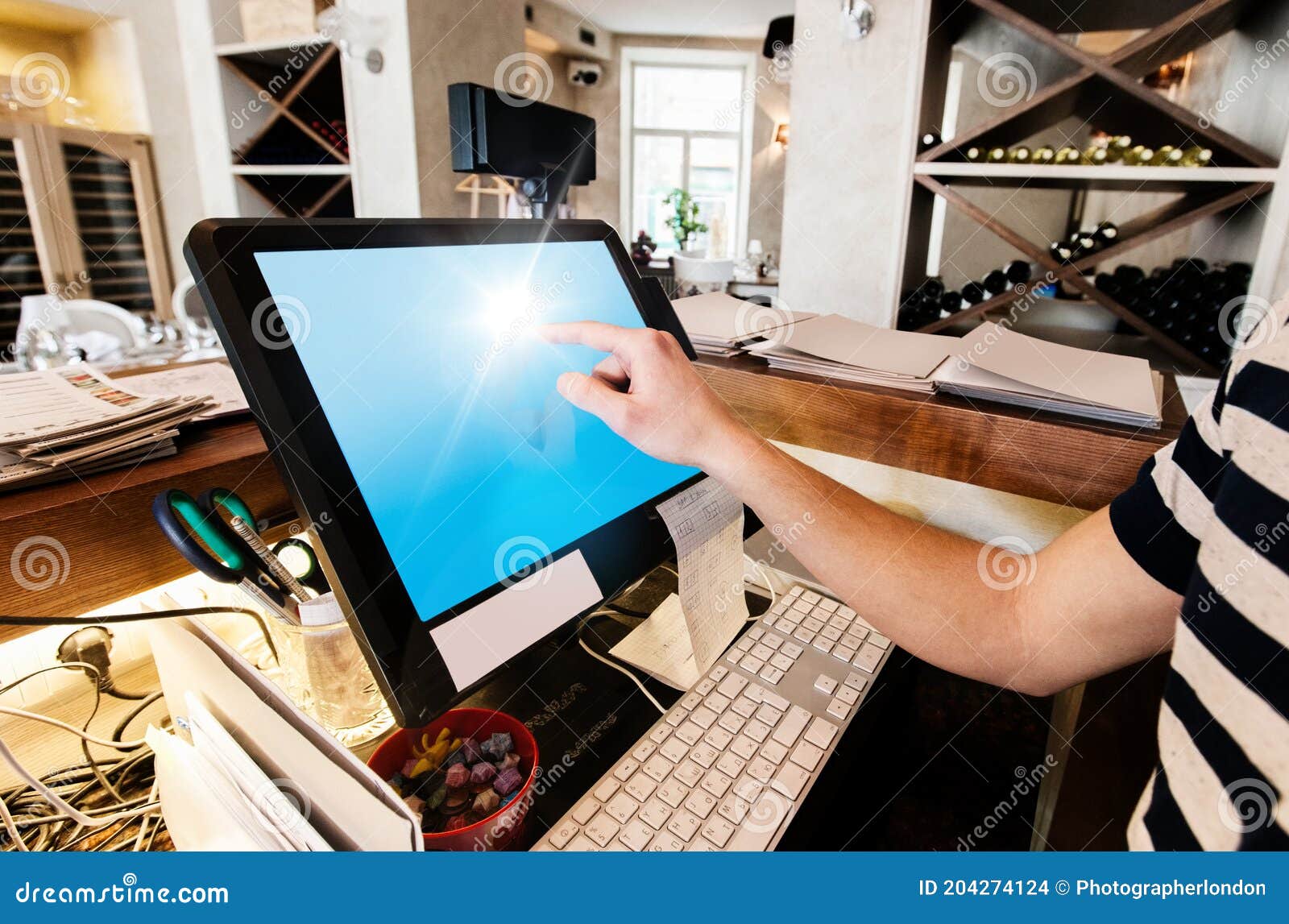 Cropped Image of Cashier Touching Computer Screen at Restaurant Counter ...