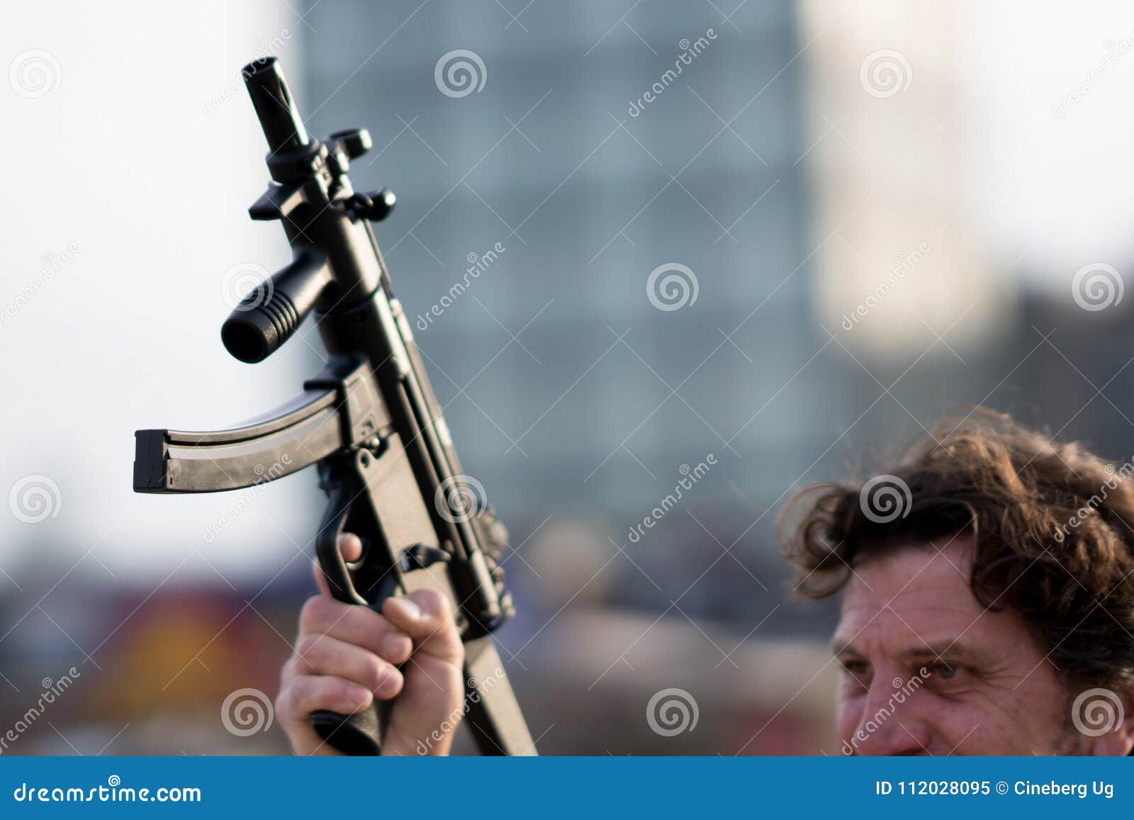 Man holding a rifle stock image. Image of soldier, bullet - 112028095