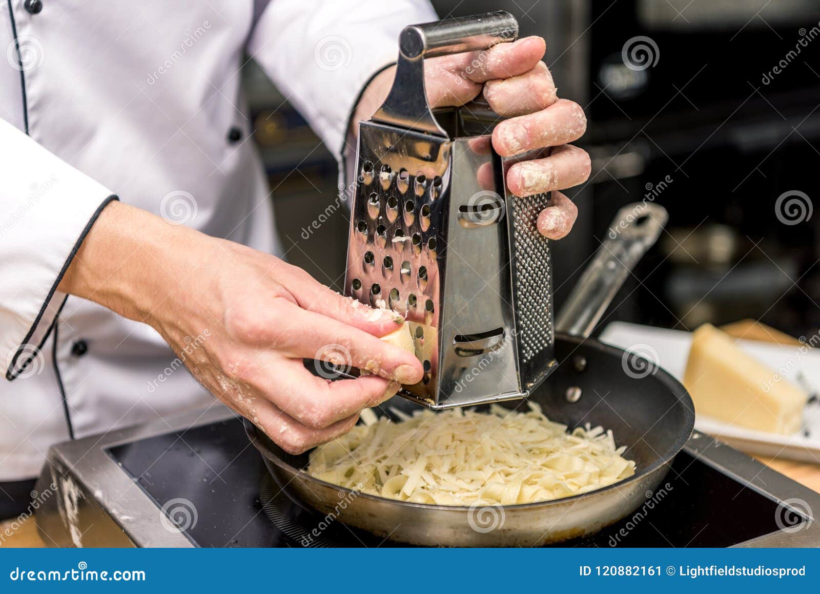 Cropped Image of Chef Grating Cheese Stock Image - Image of partial ...