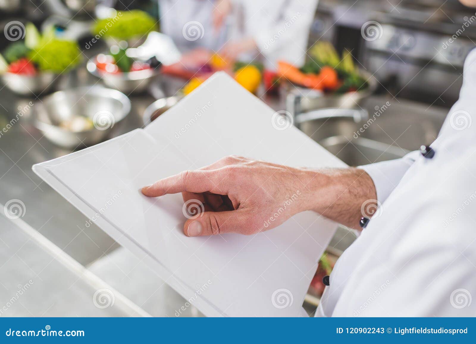 Cropped Image of Chef Reading Recipe Book Stock Image - Image of ...