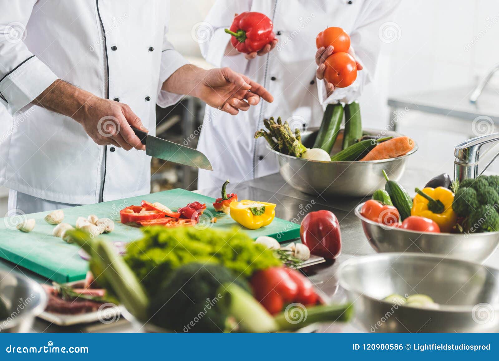 Cropped Image of Chefs Preparing Vegetables Stock Photo - Image of ...