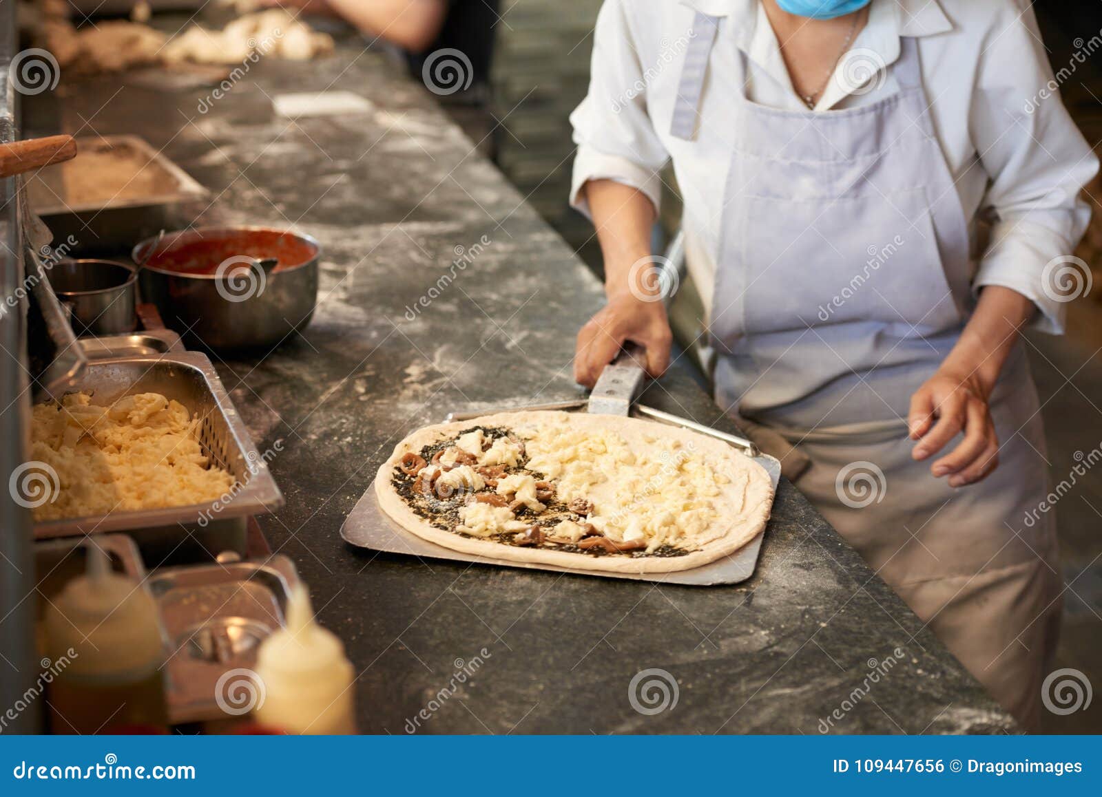 Pizza making process stock photo. Image of topping, dough - 109447656