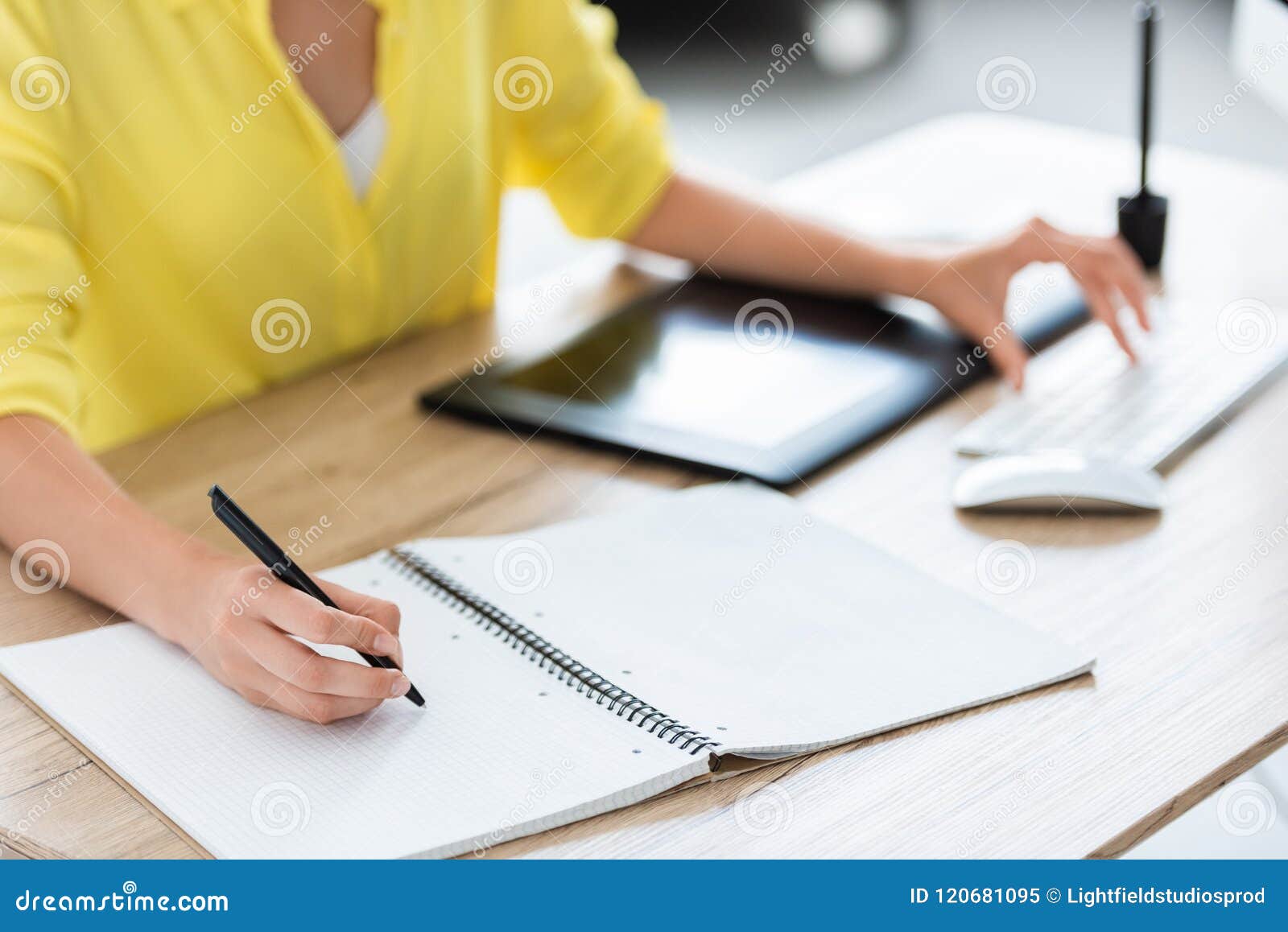 Cropped Image of Female Freelancer Writing in Textbook and Working on ...