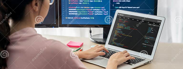 Female Developer Coding on Laptop while Computer Display Program. Burgeoning. Stock Photo ...
