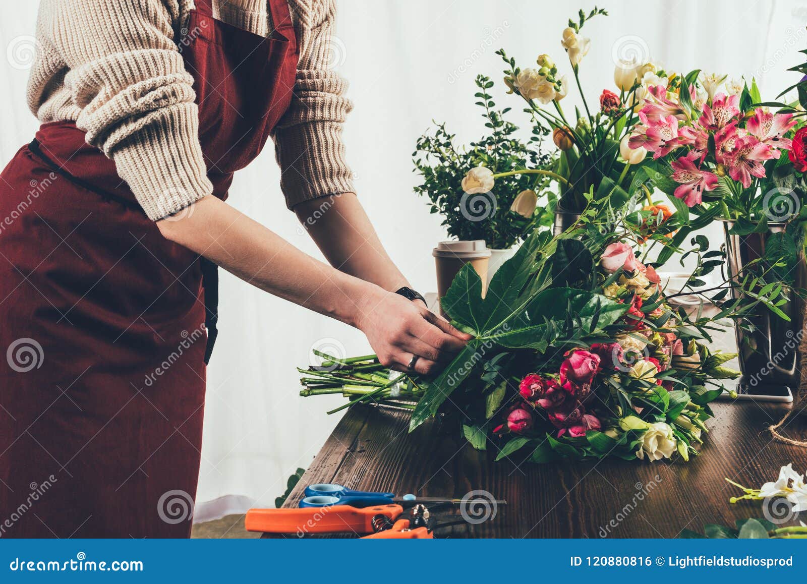 Cropped Image of Florist Adding Green Leaf Stock Photo - Image of ...