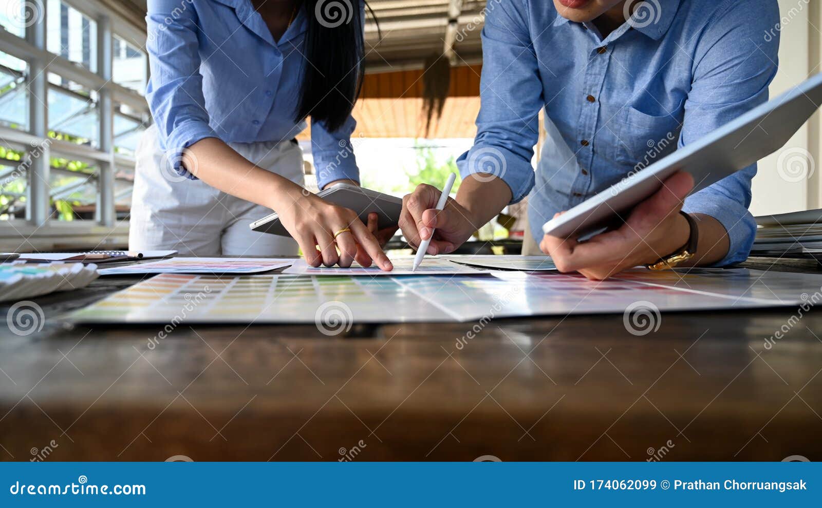 Cropped Image of Graphic Designer Discussing. Stock Image - Image of ...