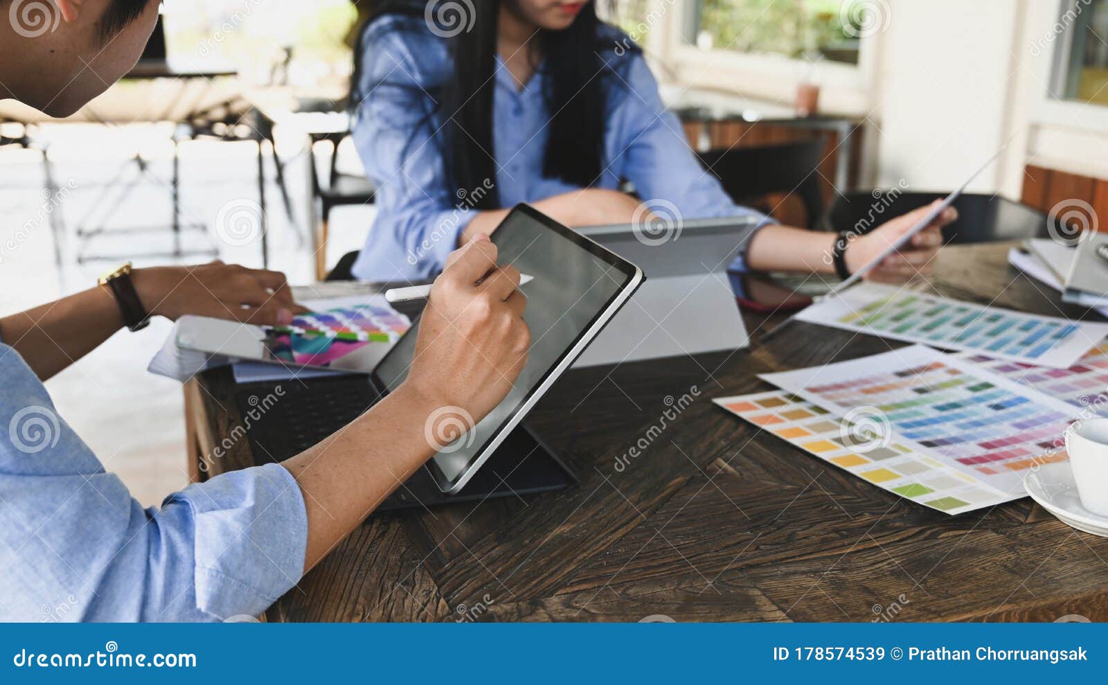 Cropped Image of Graphic Designer Team Working Together with Computer ...