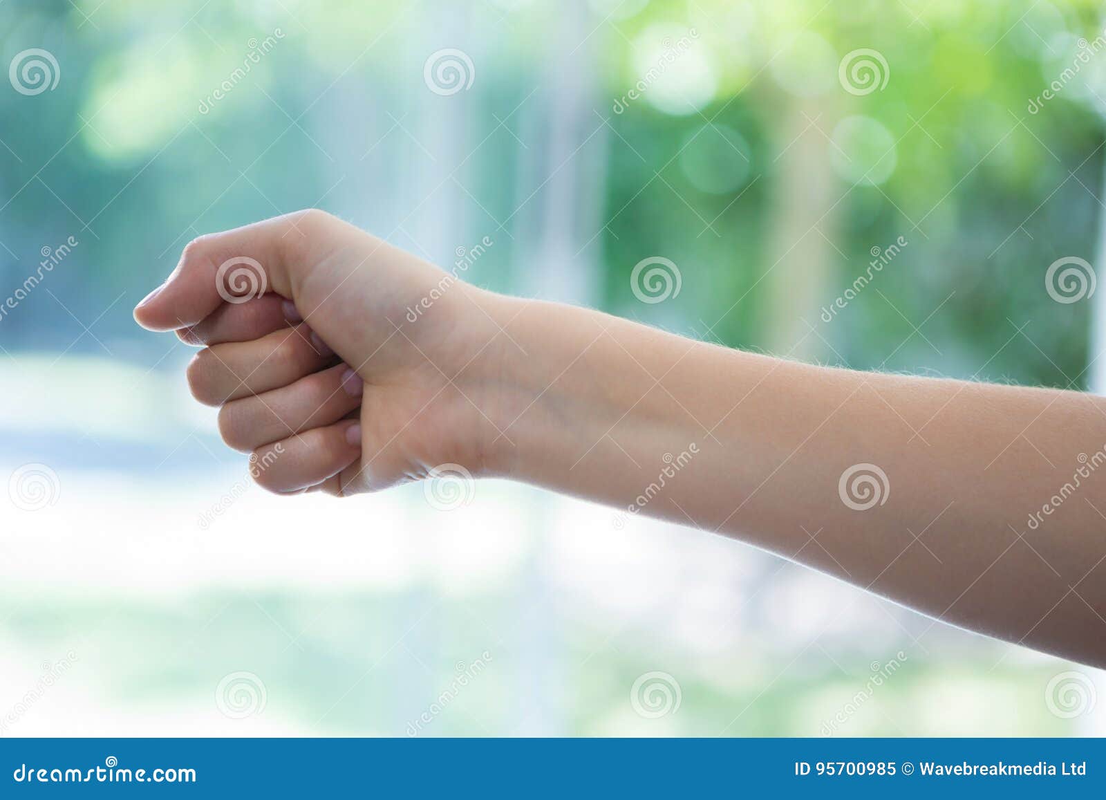 Cropped Image of Hand Clenching Fist Stock Image - Image of caucasian ...