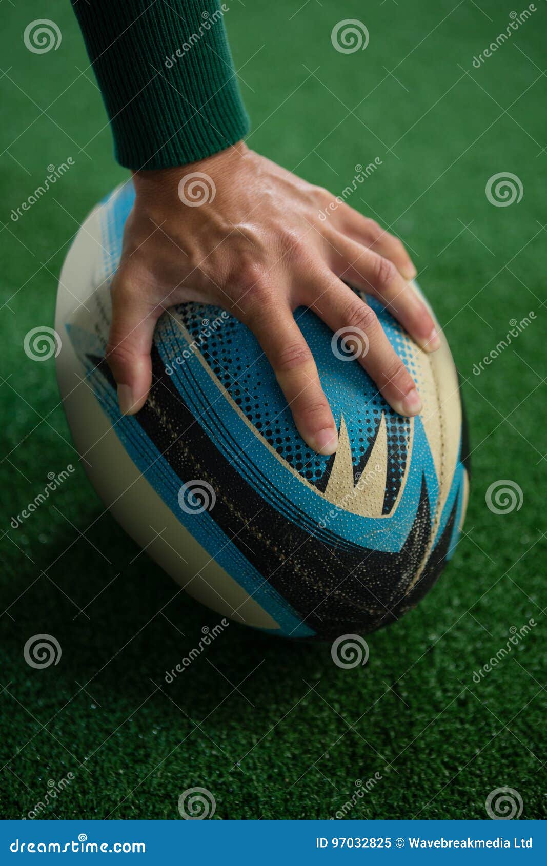 Cropped Image of Hand Holding Rugby Ball Stock Image - Image of ...