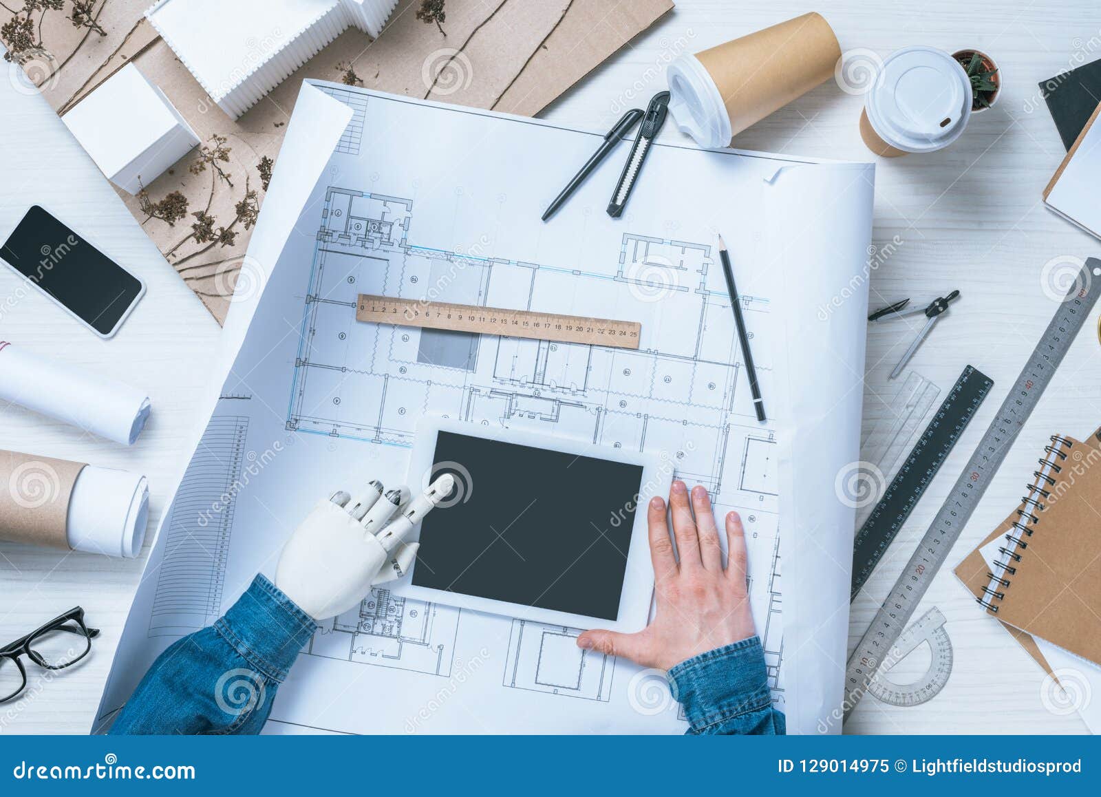 Cropped Image of Male Architect with Prosthetic Arm Using Digital ...