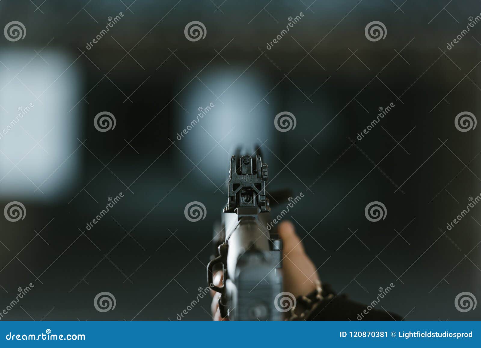 Cropped Image of Man Aiming Rifle at Target Stock Image - Image of ...