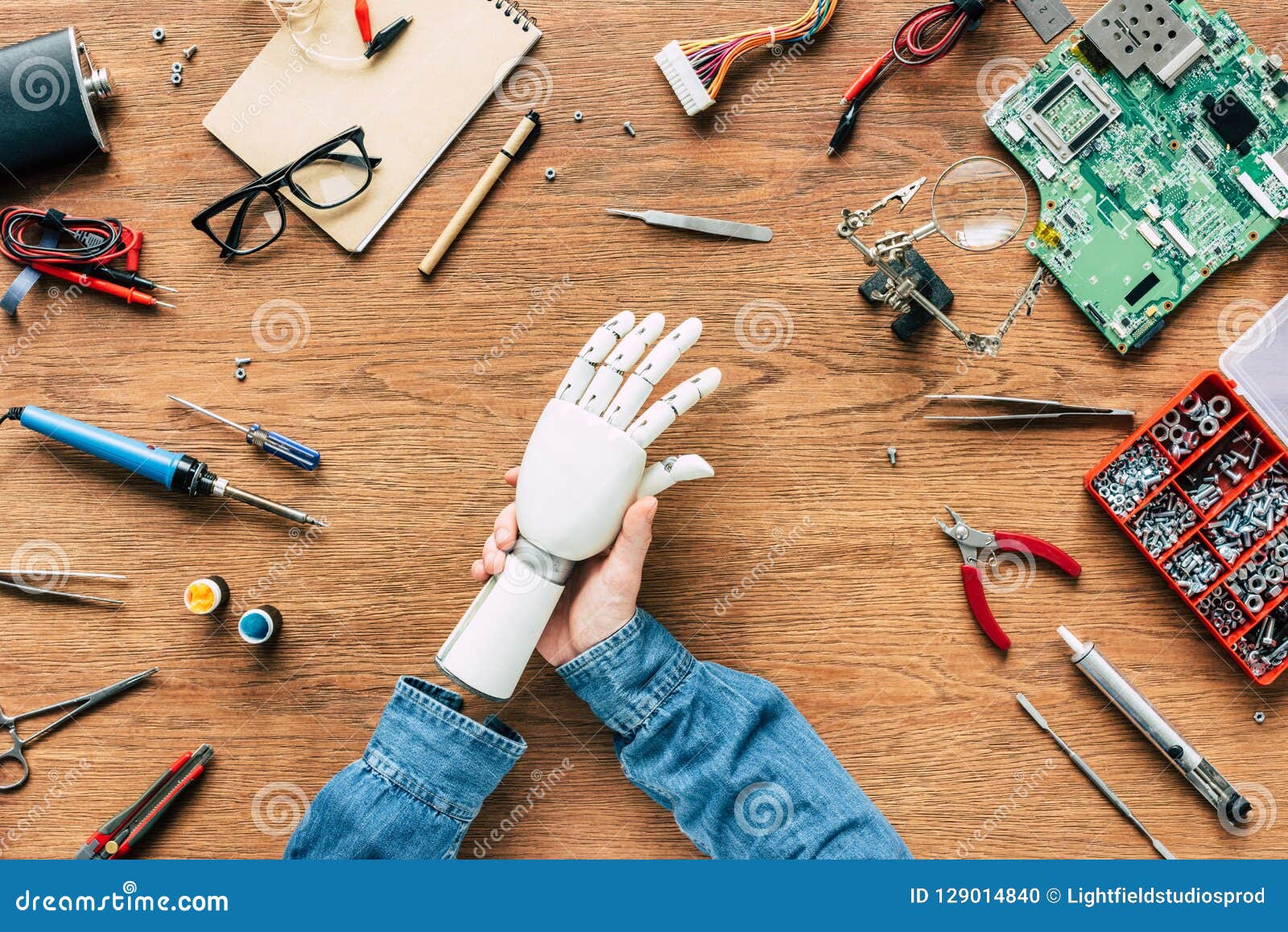 Cropped Image of Man with Amputee Putting on Robotic Hand on Table ...