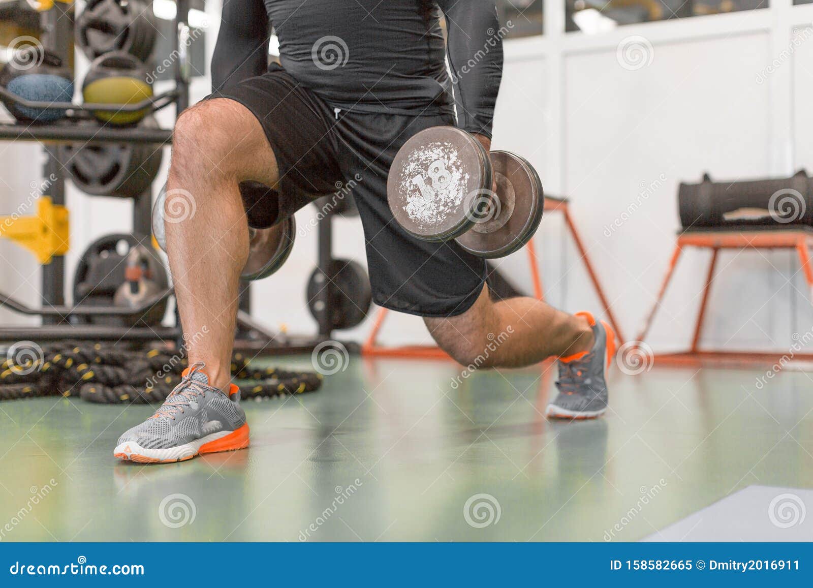 Cropped Image of a Man Doing Exercise for Legs. Man Working Out Legs ...