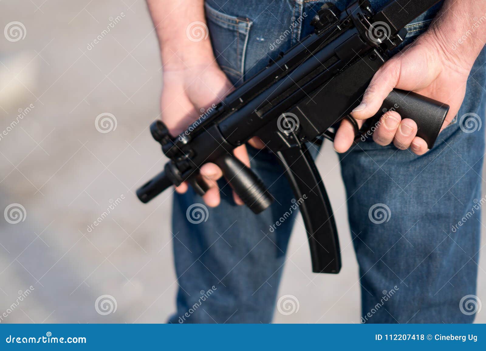 Man holding a rifle stock photo. Image of handgun, security - 112207418