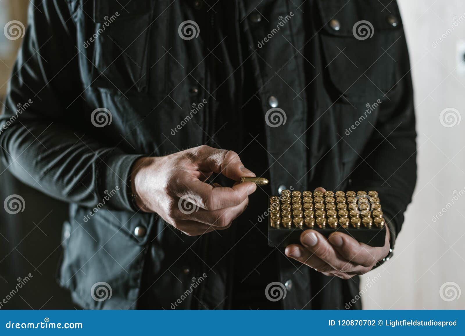 Cropped Image of Man Taking Bullet Stock Photo - Image of weapons ...