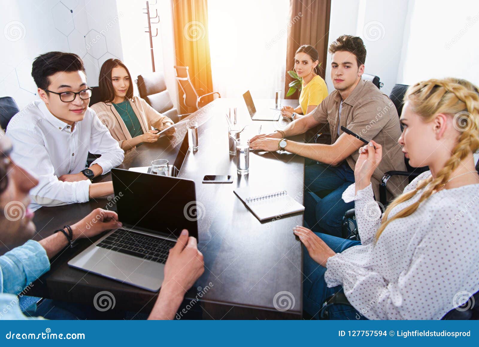 Cropped Image of Multicultural Business Partners Having Meeting at ...