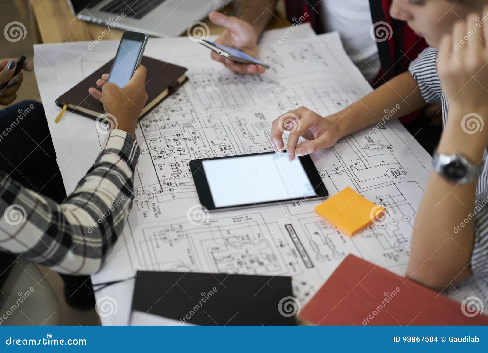 Cropped Image of People Working on Design Project Using Touchpad Stock ...