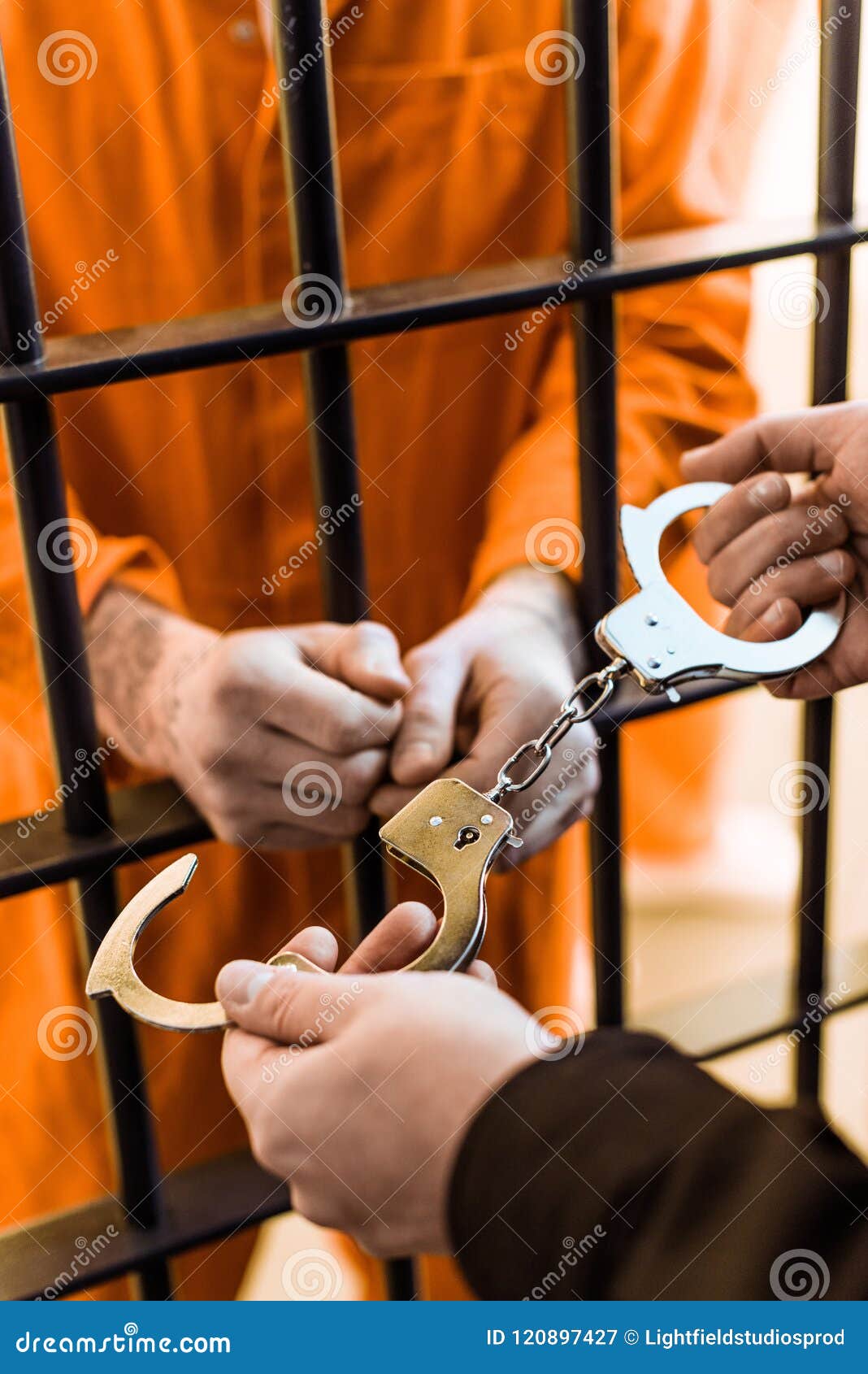 A Prison Warden Guards Cells And Surfs The Internet Via Smartphone With ...