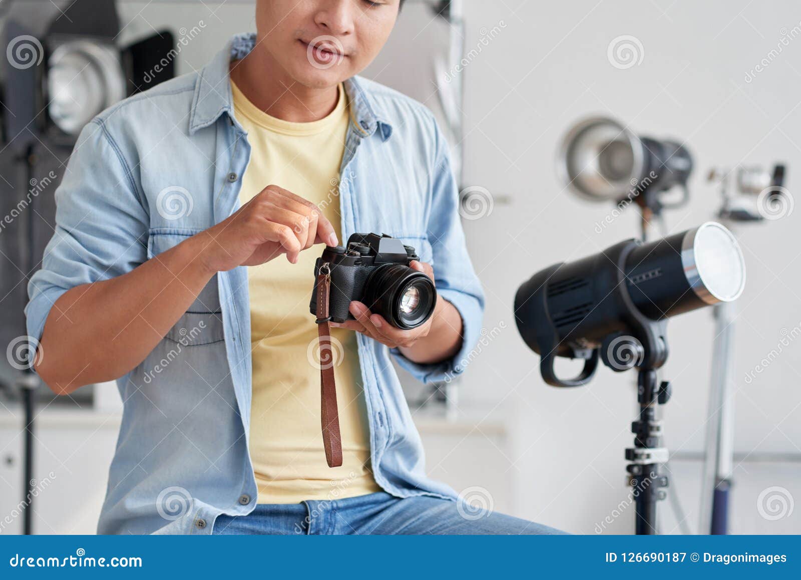 Photographer getting ready stock image. Image of dslr - 126690187