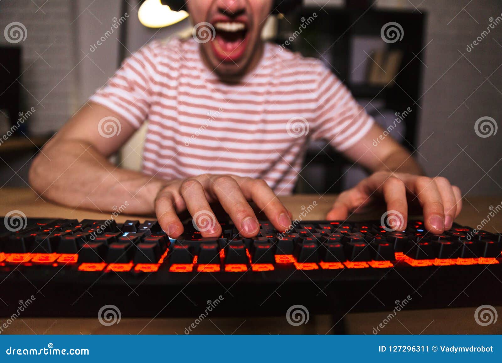 Cropped Image of Screaming Gamer Playing Video Games on Computer Stock ...