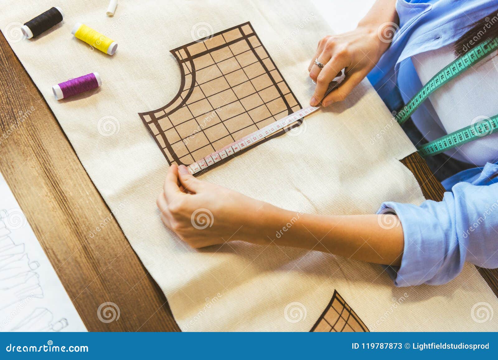 Cropped Image of Seamstress Measuring Pattern Stock Image - Image of ...