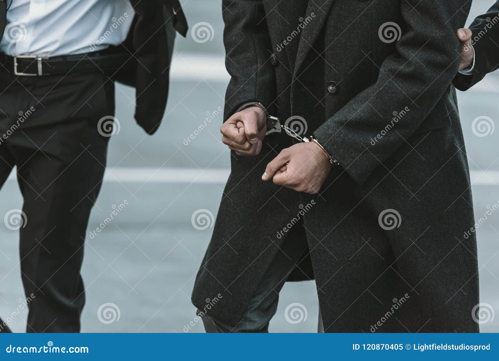 Cropped Image of Security Guard Holding Man Stock Image - Image of ...