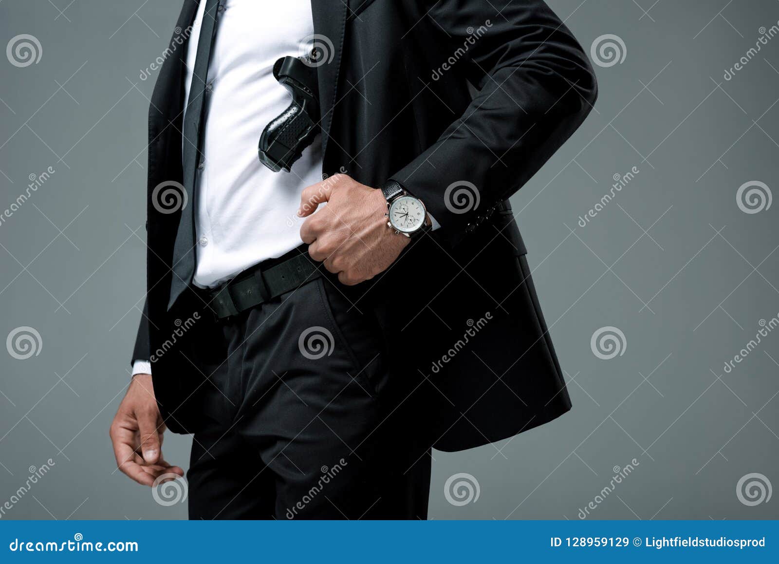 Cropped Image of Security Guard Standing with Gun Stock Image - Image ...